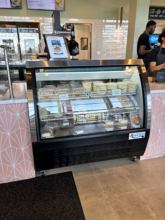 The display case: where dessert dreams come true. Each container holds the kind of Southern sweetness that grandmothers approve of.