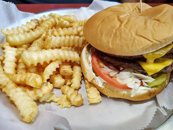 This isn't just a burger&mdash;it's a structural engineering marvel. Layer upon layer of beef, cheese, and fresh toppings create a skyscraper of satisfaction.