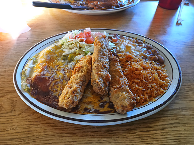 New Mexico on a plate: enchiladas, rice, and beans that don't just satisfy hunger&mdash;they tell the delicious story of regional cuisine in every bite.