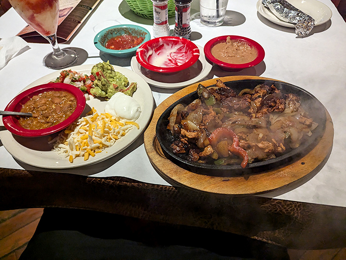 Fajitas that announce their arrival with a symphony of sizzles&mdash;the steam rising like a magic show that happens to end with you eating the props.