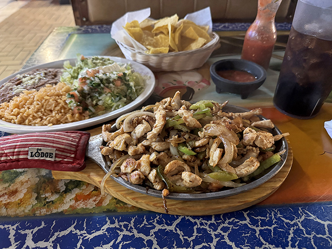 Sizzling fajitas that announce their arrival before you even see them. The aroma alone is worth the drive.