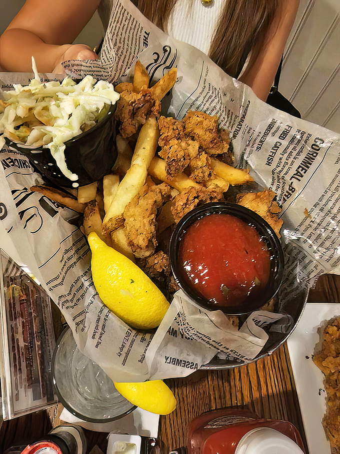 Fish and chips served with newspaper flair&mdash;crispy, flaky, and nostalgic enough to transport you to a seaside shack.