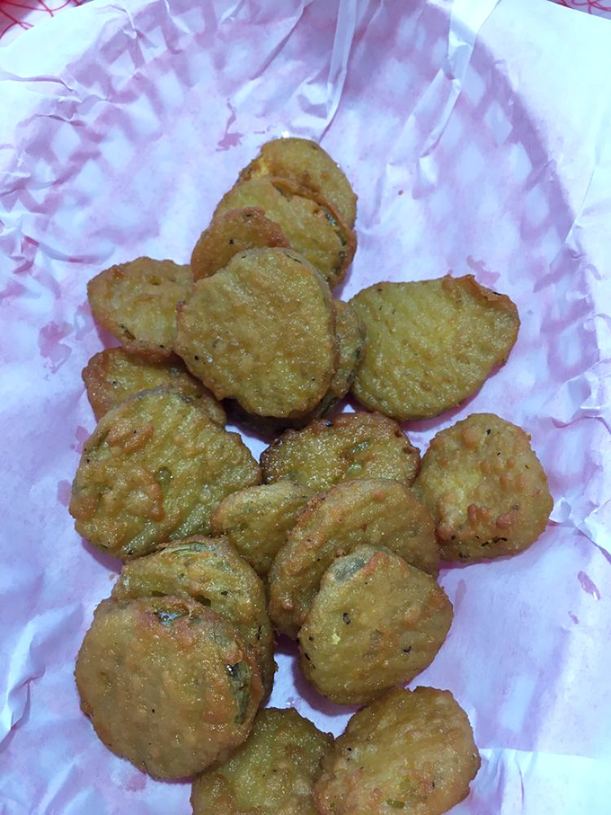 Fried pickles: Oklahoma's answer to French truffles. These golden discs transform ordinary dill into extraordinary thrills.