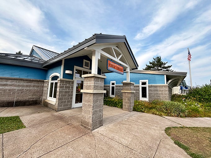 The library stands as Grand Marais' blue beacon of knowledge, where wilderness explorers can rest their legs while exercising their minds.