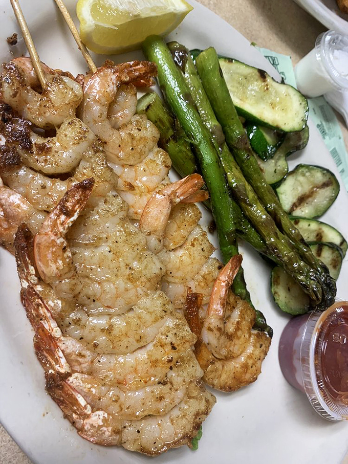 Grilled shrimp that look like they just had a spa day &ndash; perfectly seasoned, alongside asparagus and zucchini that didn't come from a freezer.