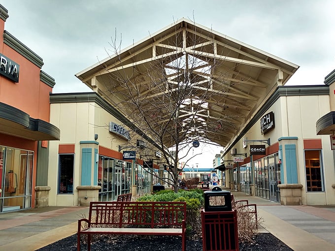 The architectural spine of outlet shopping &ndash; these covered walkways have witnessed countless "Should I buy it?" debates and victorious "Look what I found!" moments.