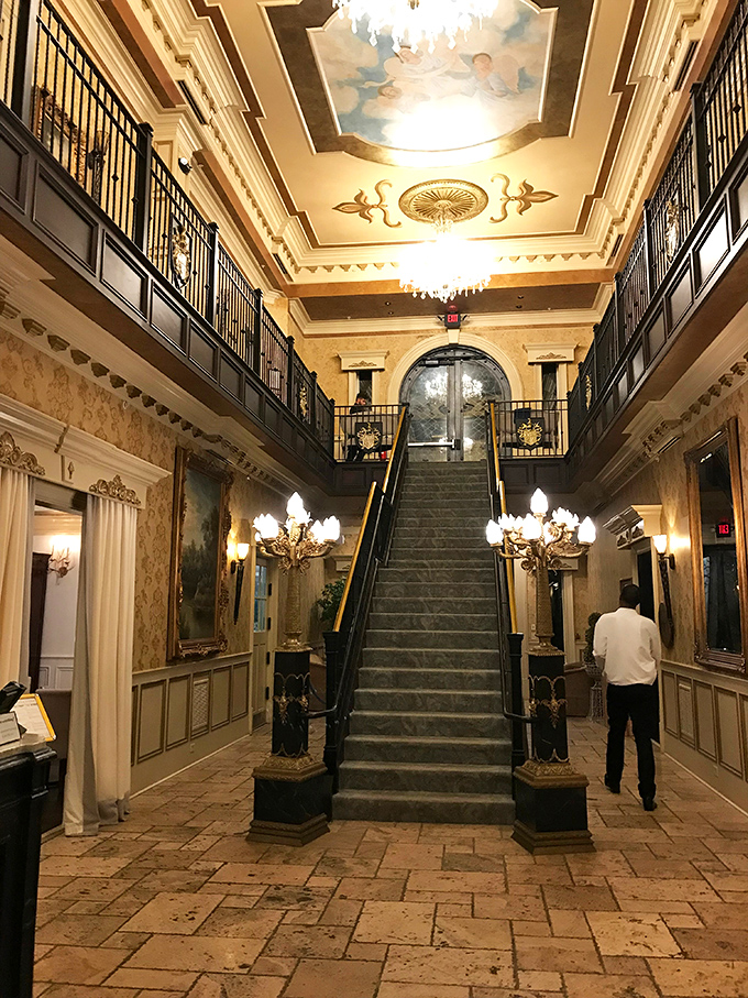 Grand staircases and ornate ceilings transport visitors to another era. This entrance hall sets the stage for the royal experience that awaits.