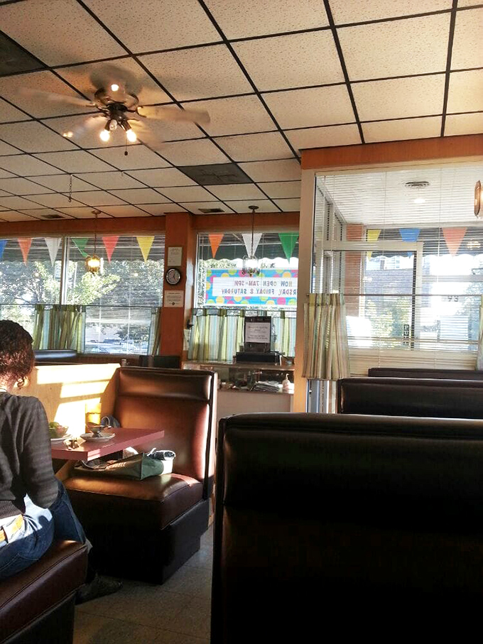 Those high-backed booths&mdash;the Switzerland of restaurant seating, offering neutral territory between privacy and people-watching.