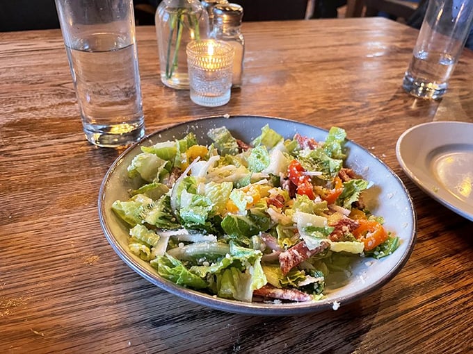 A salad that actually excites &ndash; crisp greens, vibrant vegetables, and a dressing that makes you temporarily forget about the cinnamon rolls.