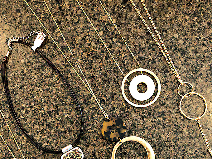 Jewelry that tells stories without saying a word. Each piece a conversation starter, a memory maker, a outfit-completer.