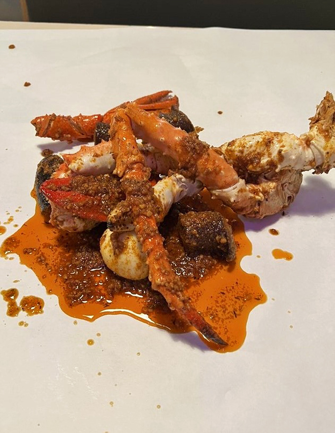 This isn't just dinner; it's a spice-crusted crustacean masterpiece that makes you grateful for whoever invented wet wipes.