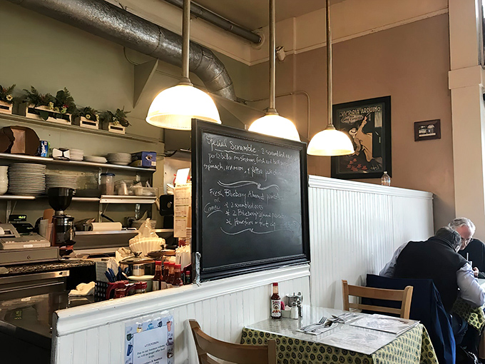 The chalkboard specials and pendant lights create that "neighborhood joint" atmosphere money can't buy but calories can enjoy.