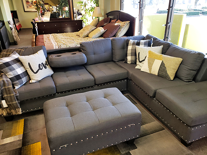 This sectional with perfectly arranged throw pillows represents who we wish we were, not who we actually are as homeowners.