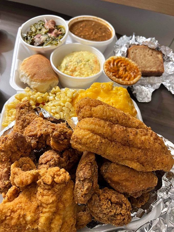 A feast fit for royalty: crispy fried chicken, tender fish, and sides that make you question why vegetables ever had a bad reputation.