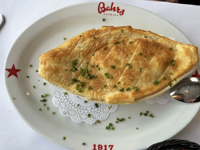 This golden-topped pie isn't just a dish&mdash;it's edible architecture, with a flaky roof protecting the treasures of the sea hiding underneath.