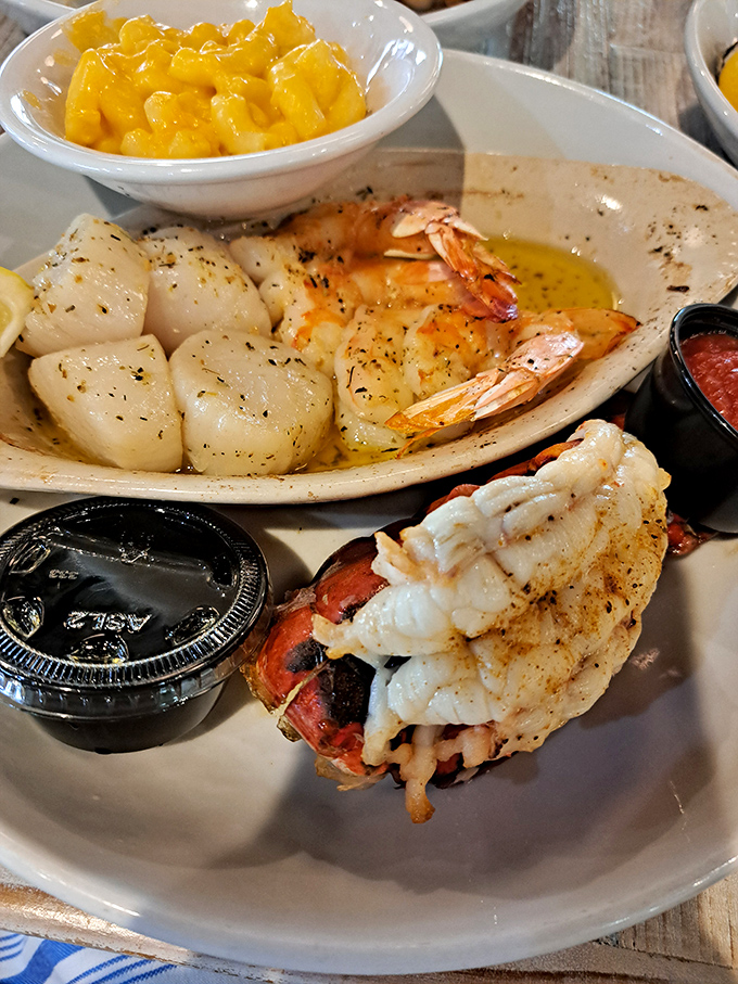 The seafood trifecta that puts landlocked restaurants to shame. That lobster tail is making a compelling argument for coastal living.