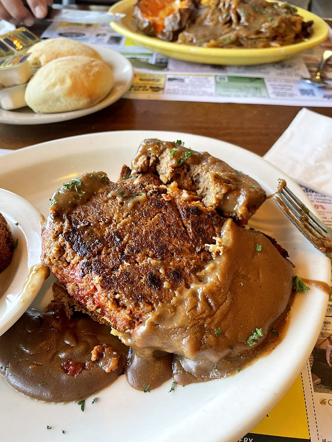 Meatloaf that doesn't apologize for being meatloaf. This is comfort food with the confidence of a Broadway star.
