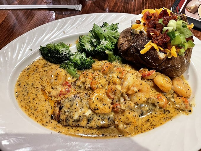 A symphony of flavors—tender fish bathed in creamy sauce studded with plump shrimp. The broccoli provides a virtuous counterpoint. Photo credit: <a href="https://www.yelp.com/user_details?userid=289CvBOLhpFtt_UyG0ZmKA" target="_blank" rel="noopener noreferrer">Alicia T.</a>