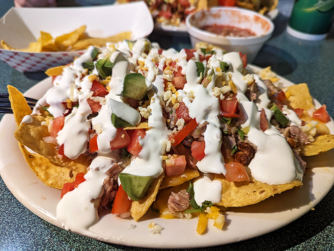These nachos aren't messing around &ndash; loaded with enough toppings to make chip-finding an archaeological expedition worth embarking on.
