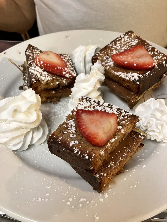 Dessert disguised as breakfast: Nutella-banana French toast squares topped with strawberries and the sweet excuse of "I'm on vacation."