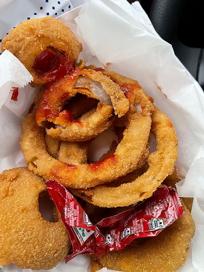 Onion rings shouldn't be afterthoughts, and these golden halos aren't. Crispy, substantial, and requiring that satisfying pull-apart bite that defines ring excellence.