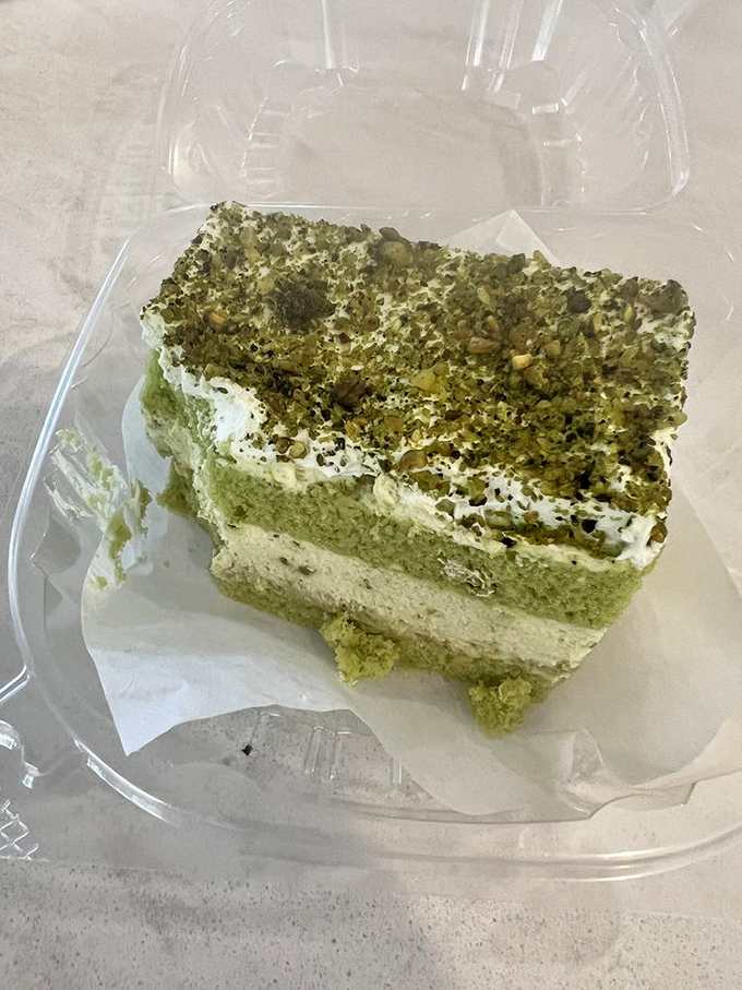 This pistachio cake isn't just dessert&mdash;it's an edible emerald treasure with layers of creamy filling that whisper "one more bite."