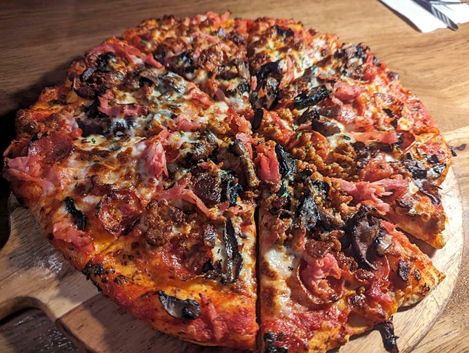 Pizza perfection isn't about geometry&mdash;it's about generosity. Those toppings aren't just ingredients; they're a commitment to indulgence without pretense.