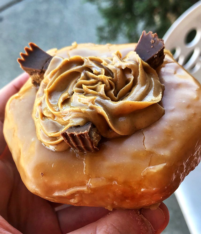 The Reese's donut doesn't just incorporate peanut butter&mdash;it celebrates it with a crown of creamy frosting and candy chunks in triumphant, salty-sweet harmony.