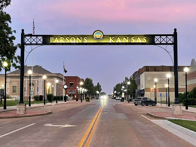 Parsons after dark – when the illuminated archway reminds you that small-town magic doesn't require big-city electric bills to shine.