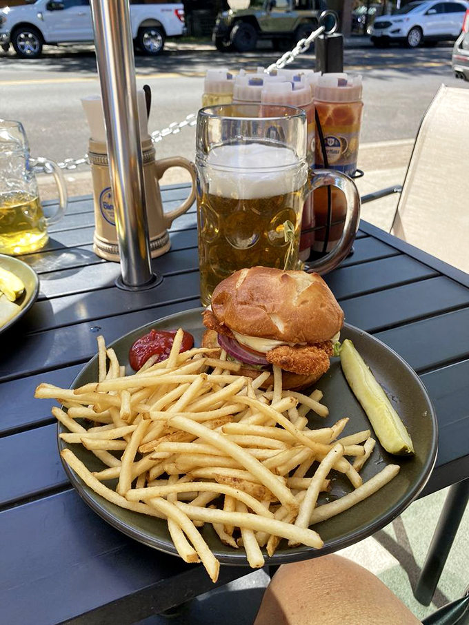 That sandwich is giving "I'm worth driving across state lines for" energy. Paired with a proper beer mug—because sippy cups are for amateurs.