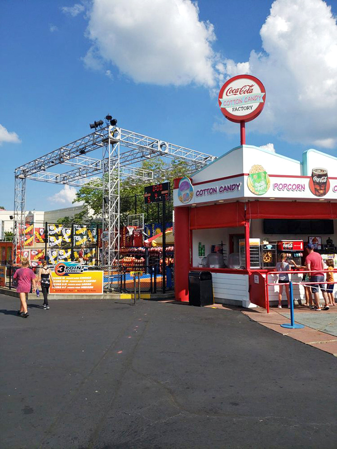 The Cotton Candy Factory stands like a sugary beacon, promising a sticky-fingered happiness that no smartphone app could ever replicate.