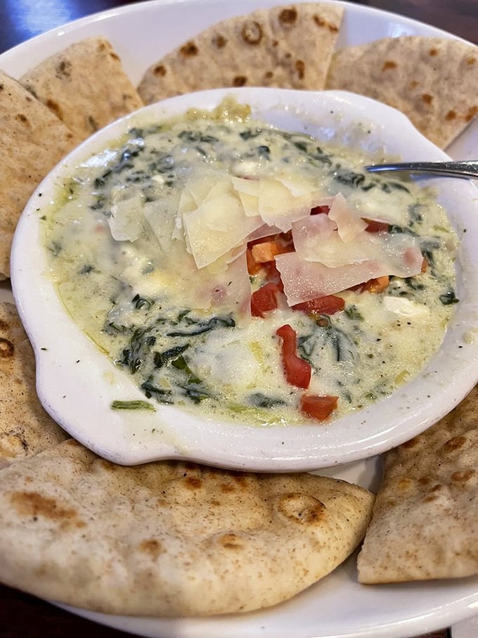 Spinach artichoke dip that achieves the perfect cheese pull&mdash;stretching just enough to make your tablemates jealous of your portion.