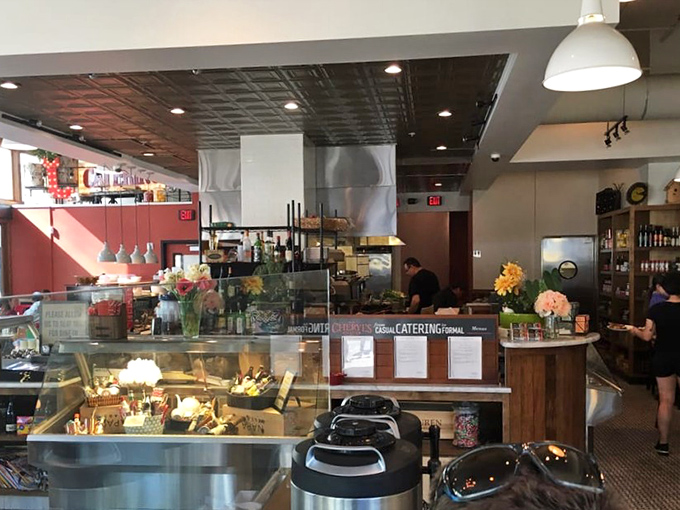 Behind this wooden counter, breakfast magic happens with the precision of a Swiss watch and the soul of a Southern grandma.