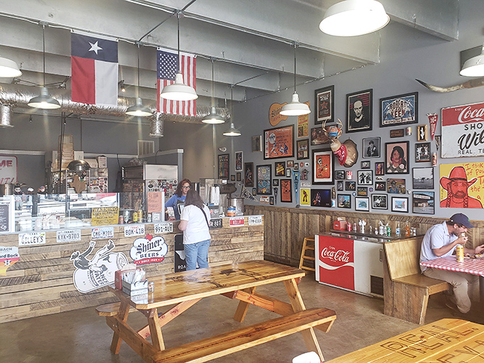 The dining area feels like a Texas barbecue joint teleported to Tennessee, complete with flags, memorabilia, and the promise of meat sweats.
