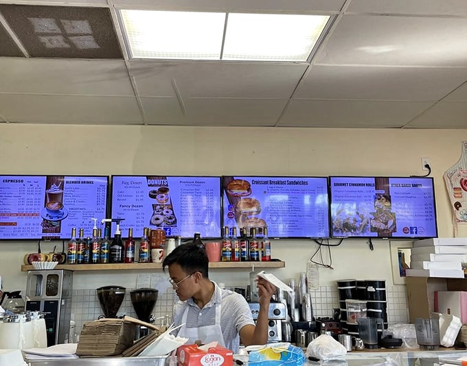 Behind the counter magic: where dough becomes legend and coffee flows like liquid optimism to fuel your sugar high.