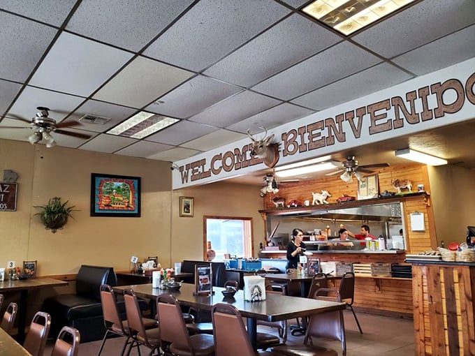 "Welcome/Bienvenidos" spans the wall, but the real welcome comes from the aromas wafting from that kitchen.