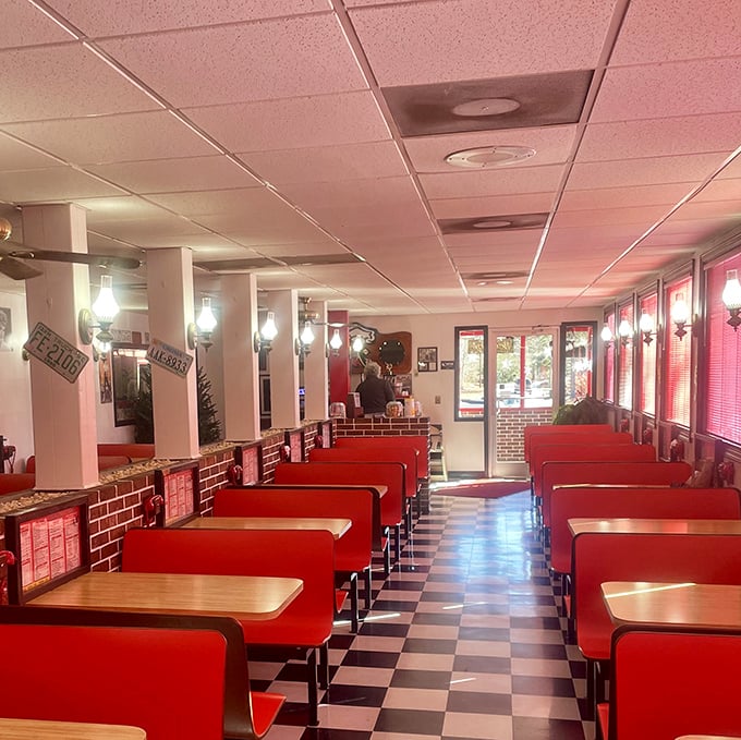Red booths stretching into infinity like a Norman Rockwell painting come to life. This isn't just a dining room&mdash;it's Americana preserved.