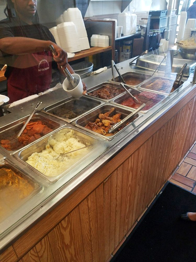 Every great Southern meal has someone behind it who knows what they're doing. Those serving spoons are wielded with the confidence of experience.