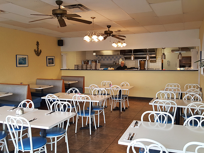 The open kitchen design isn't about showing off—it's a statement of confidence. Nothing to hide when you're cooking with tradition and heart.