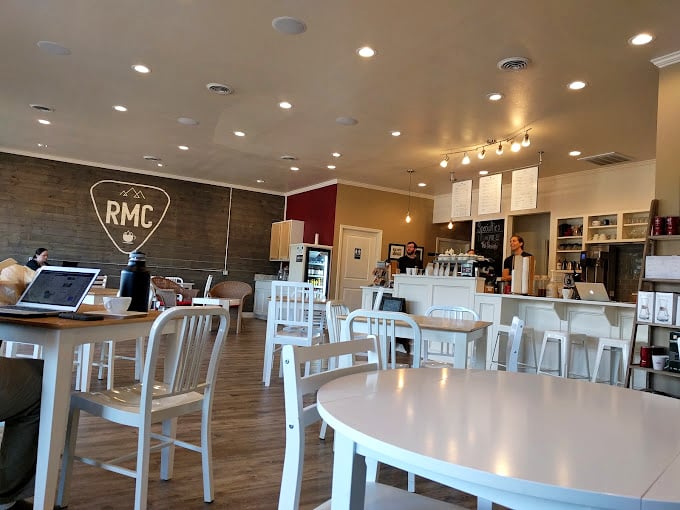 Clean lines, creative lighting, and the "RMC" logo creating the perfect backdrop for Conway's coffee seekers and conversation makers.