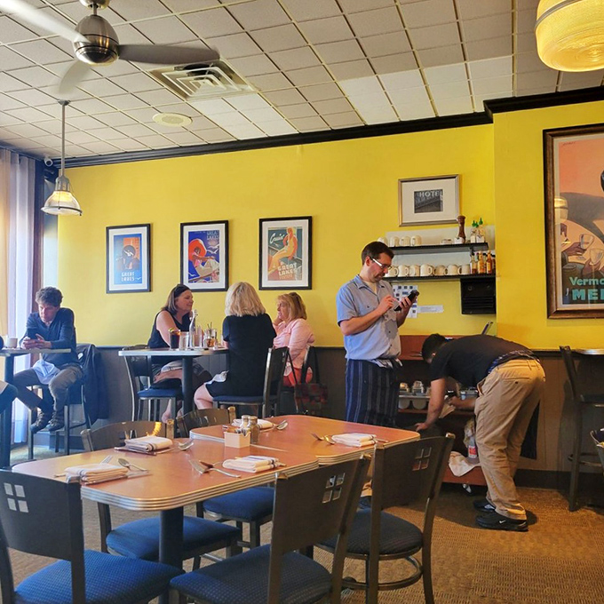 Where breakfast magic happens—the counter service area showcasing pastries that silently taunt you to save room for dessert.