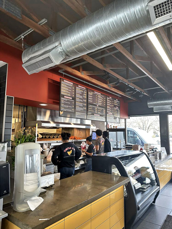 Where orders become edible art. The open kitchen design lets you witness the choreography of comfort food creation.