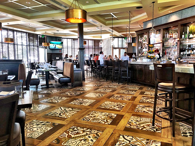 The restaurant's thoughtful design elements extend upward, where dramatic lighting creates an atmosphere that's both elegant and welcoming.