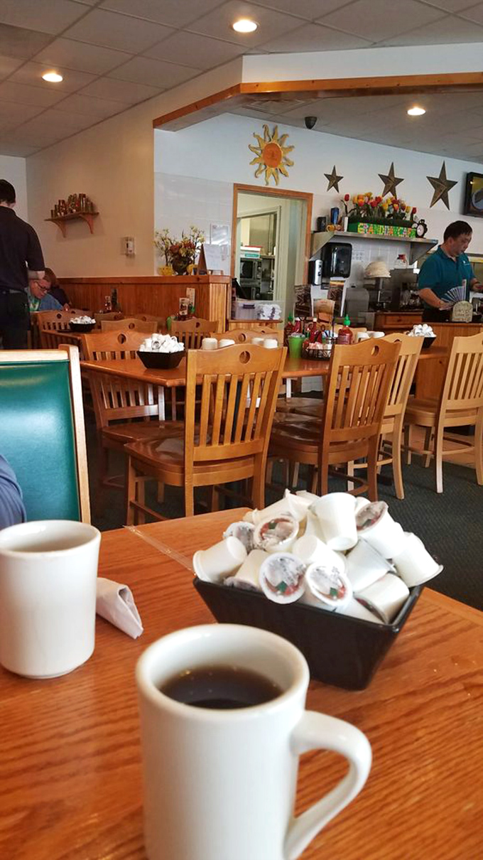 Where coffee cups are never empty and the staff moves with the practiced efficiency of breakfast ballet performers.