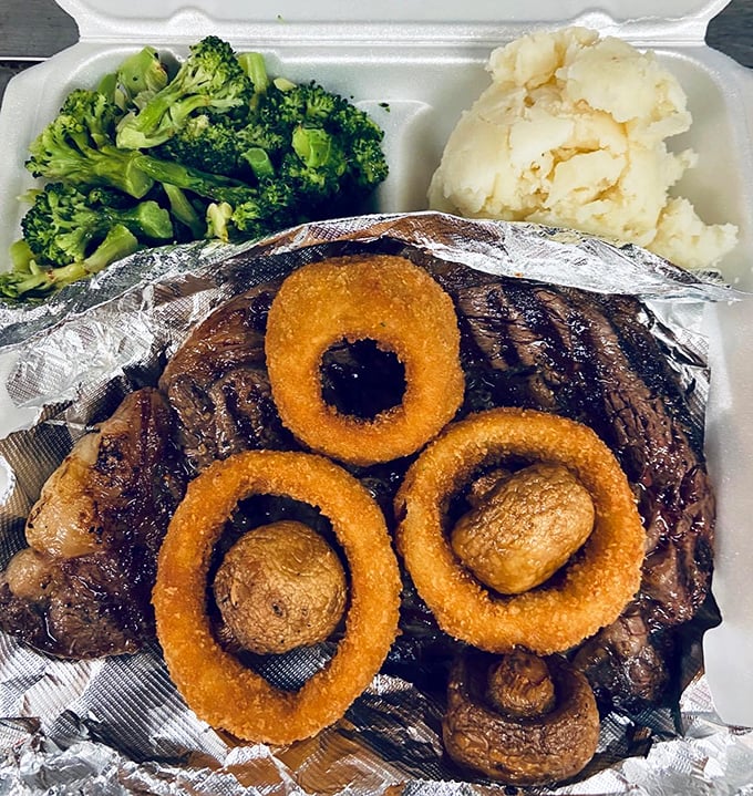 A steak dinner with onion rings that doesn't require a second mortgage&mdash;the American dream served on aluminum foil.