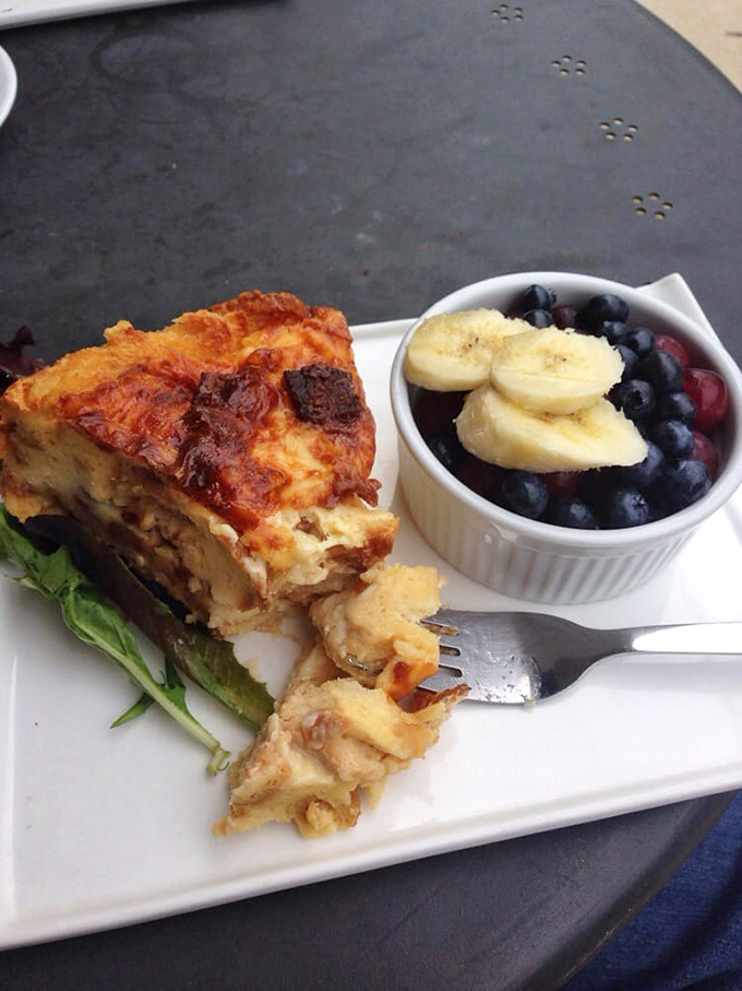 Quiche that doesn't apologize for being itself, accompanied by summer berries that make you forget you're actually eating something relatively healthy.