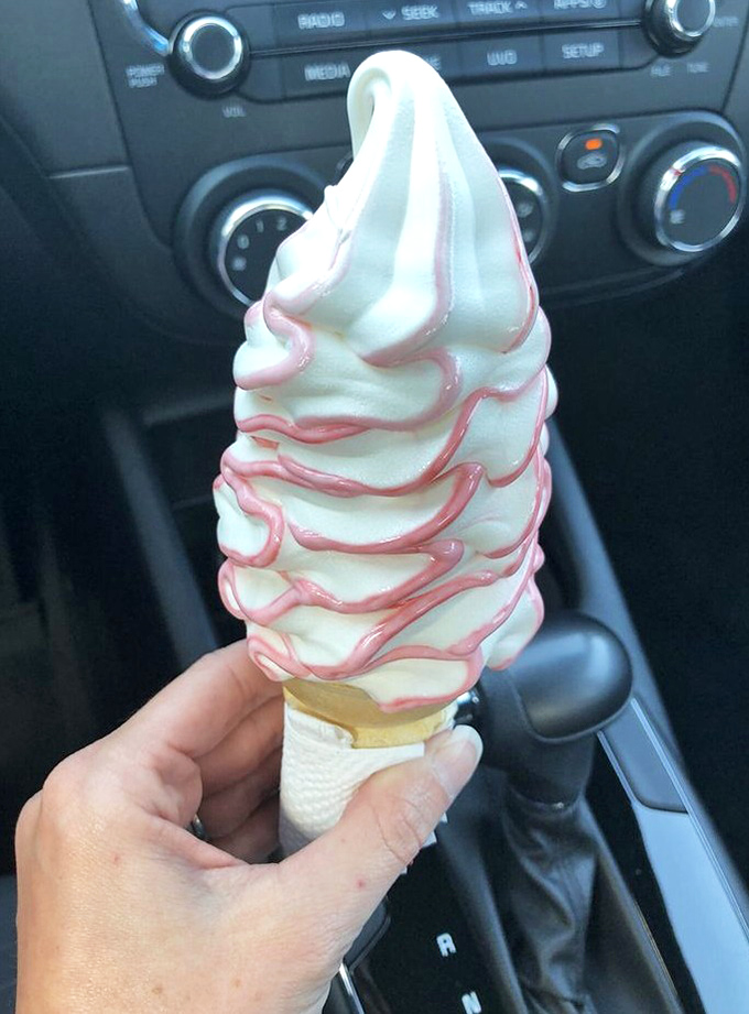 The vanilla-strawberry twist that makes adults remember what it's like to be eight years old again. Pure joy on a cone.
