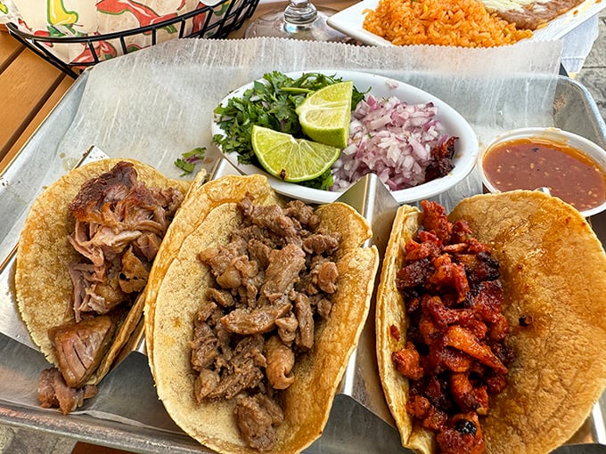 Street tacos presented with such perfect simplicity they'd make a minimalist architect weep. The lime wedges aren't optional&mdash;they're essential punctuation marks.