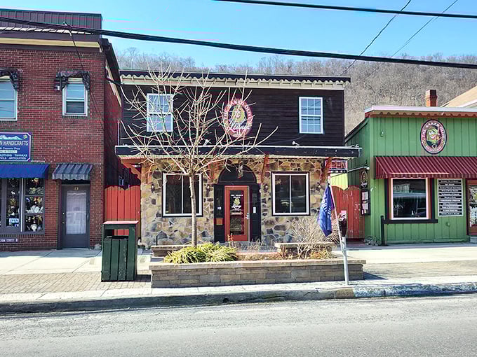 The Naked Olive's stone facade and red door create the perfect storybook entrance. You half expect to find a fairy tale inside.