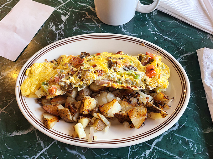 The ultimate omelet lives up to its name&mdash;packed with enough fillings to count as breakfast, lunch, and possibly dinner.